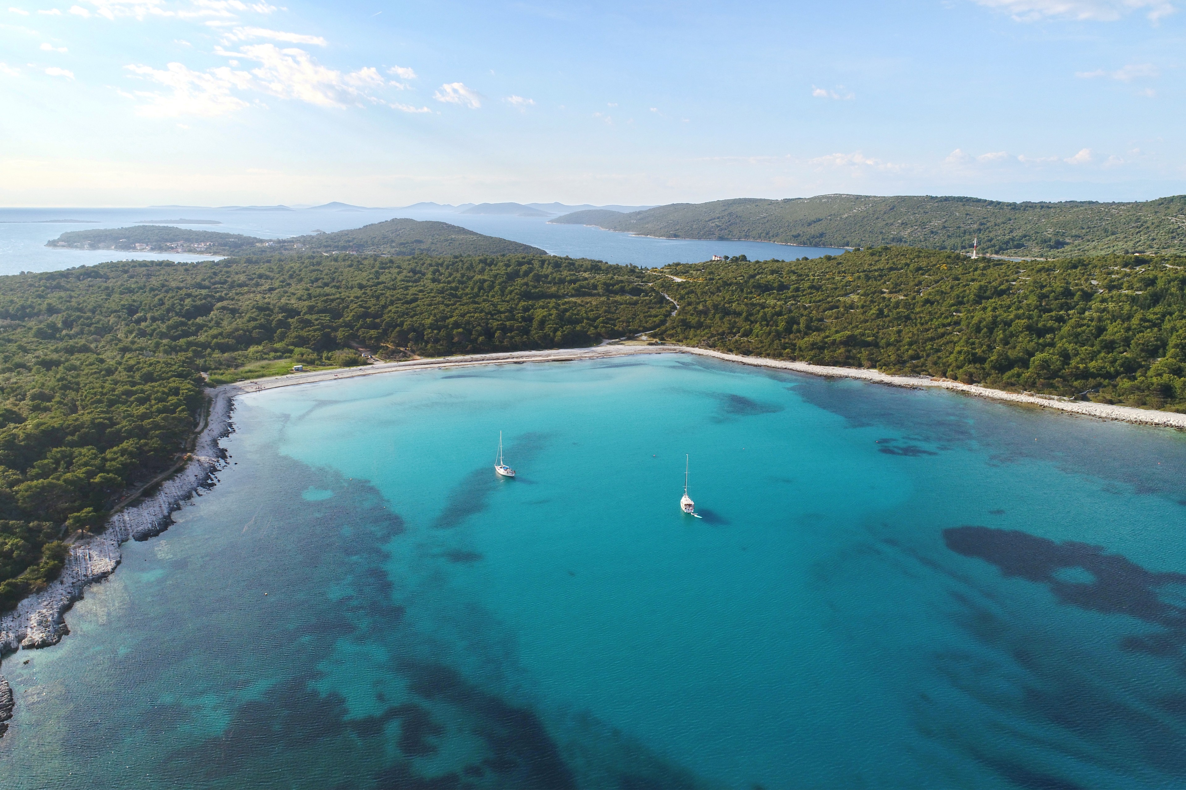 Božava: a place of peace, blue sea, and pine-surrounded bays